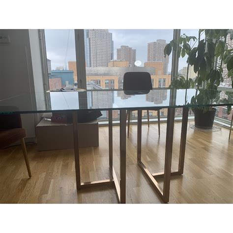 Cb2 Glass And Brass Dining Table Aptdeco