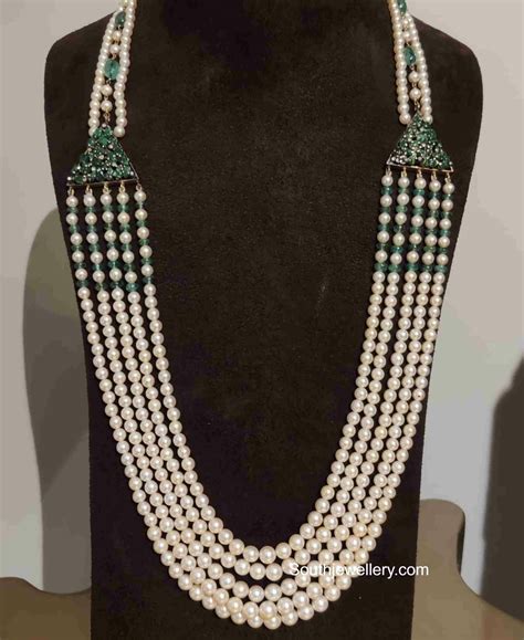 South Sea Pearl Mala With Emerald Side Brooches Indian Jewellery Designs
