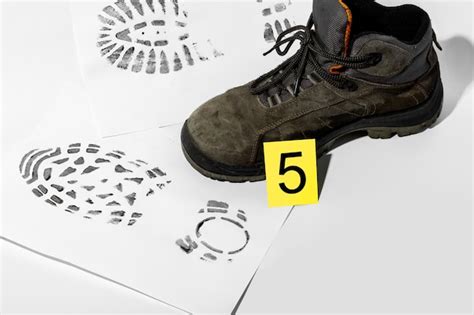 Premium Photo A Boot Print A Shoe For Comparing Prints For