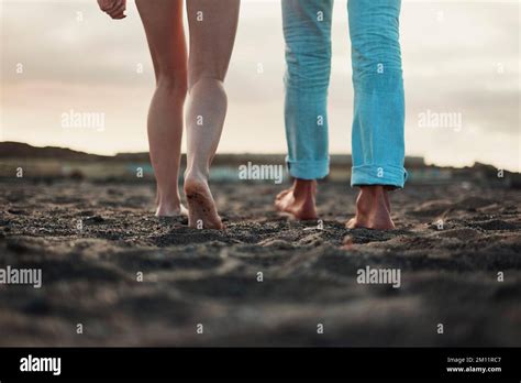 Close Up And Legs View For Man And Woman Walking Together On The Ground