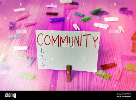 Writing Note Showing Community Business Concept For Specific Population With A Common