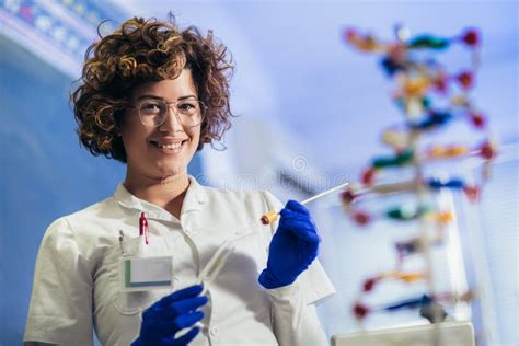 Scientist Looking At DNA In Laboratory Stock Photo Image Of Helth Chemist