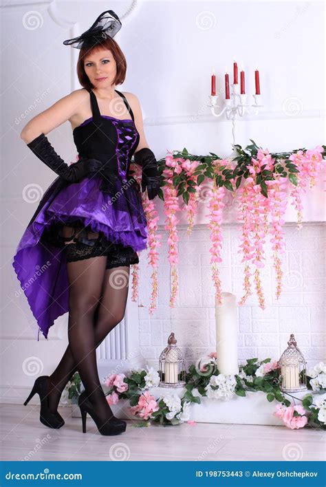 Legged Redhead Model In Black Minidress Posing In Studio Stock Image Image Of Studio Posing