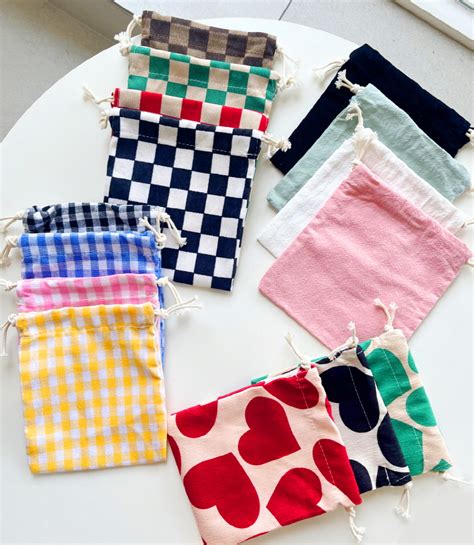 💖11특가15종💖 다용도 복조리 파우치 생리대파우치 화장품파우치 체크 하트 체커보드 무지 미니파우치 에이블리