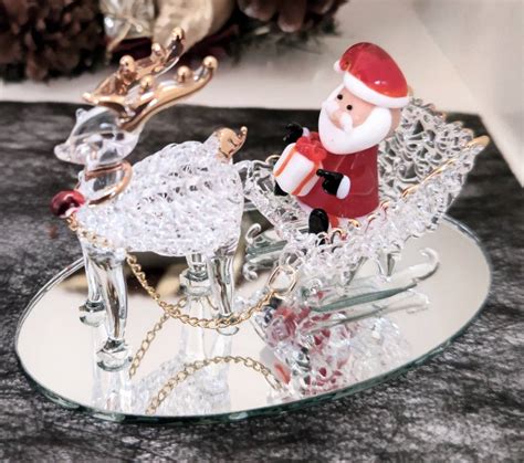 ソリに乗ったサンタクロース サンタクロース置物 サンタクロース人形