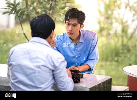 In A Tense Situation Between Men At Odds With Each Other Internal Conflict Of Relation Stock