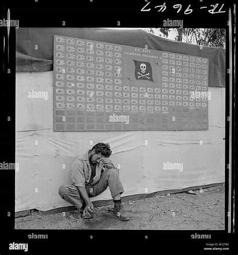 Tired Member Of Vf 17 Pauses Under Squadron Scoreboard At Bougainville General Notes Use War