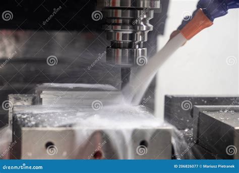 Metalworking Cnc Lathe Milling Machine With Coolant Milling Apiece Of Aluminium Stock Image