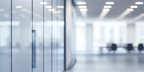 Blurred Office Interior With A Glass Door And White Wall Background