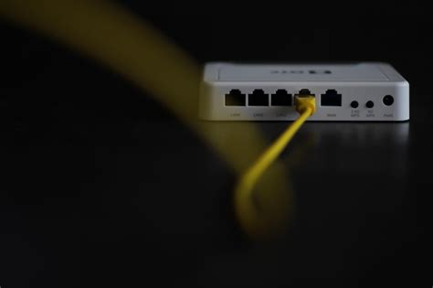 Premium Photo Modern Dual Band Wireless Router Man Working In The Background Fast And Wireless