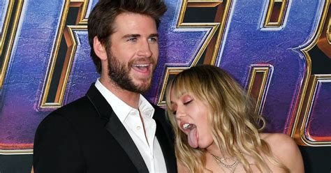 Is Miley Cyrus Wearing Liam Hemsworths Suit In Her Flowers Video