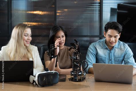 Male And Female Engineer Working With Ai Robot Arm System Project In Workshop Male Engineer
