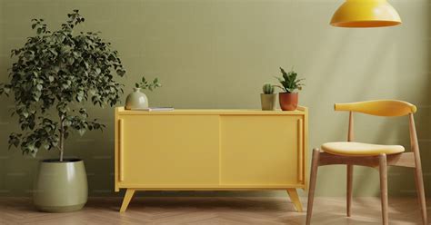 빈 녹색 벽 배경에 안락의자와 캐비닛이 있는 거실 인테리어3d 렌더링 사진 Unsplash의 기술 이미지