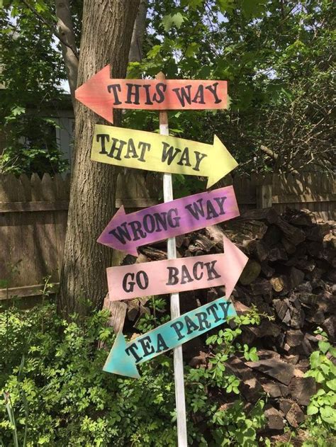 Colorful Wooden Sign Pointing The Way Hosting Occasions