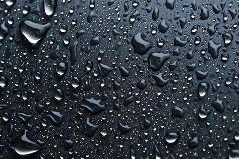 Gotas De Agua Sobre Un Fondo Negro Gotas De Agua Sobre Un Fondo Negro