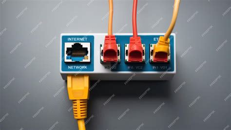 A Top Down View Of An Ethernet Hub Connected With Multiple Cables