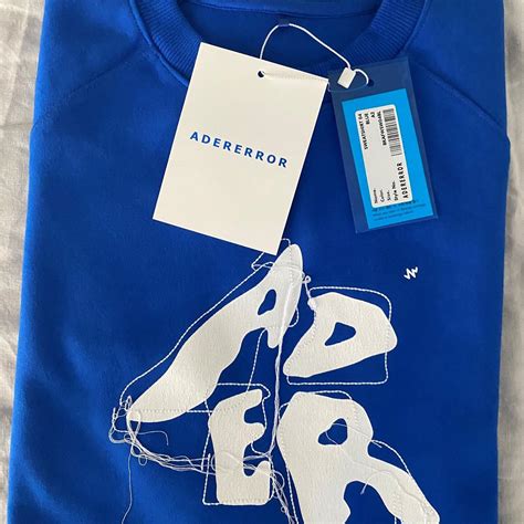 ader error blue sweatshirt in solid color with depop