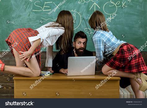 Sexology Teacher Looks Two Sexy Female Stock Photo