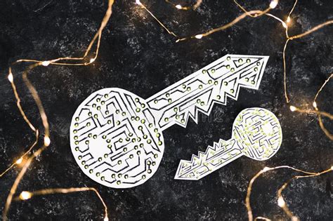 Big And Small Encryption Key Icon Made Of Circuits And Led Lights On