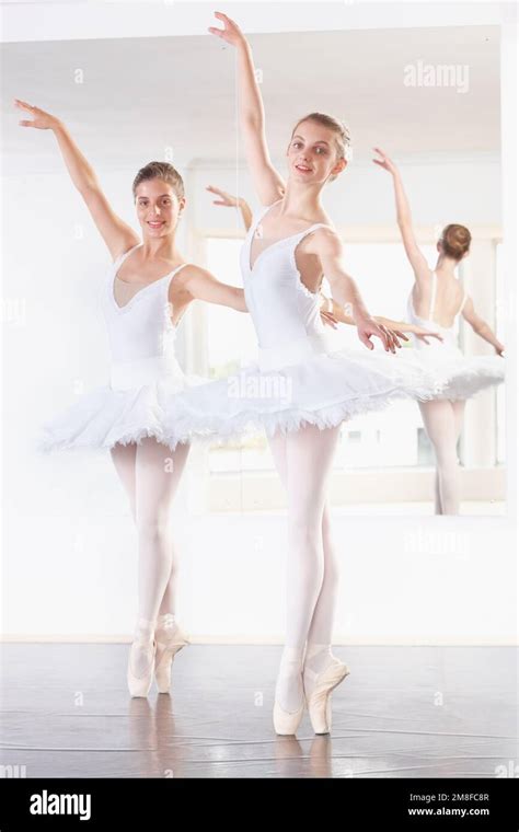 Dancing In Perfect Unison Full Length Shot Of Two Ballerinas