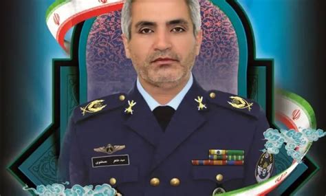 ادای احترام نظامی دختر شهید خلبان سید طاهر مصطفوی به تابوت پدرش عکس