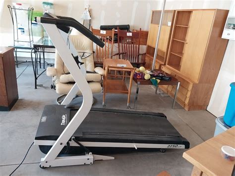 TRIM UP FOLDING TREADMILL WITH DIGITAL PANEL EstateSales Org