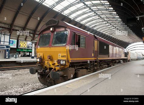 Class 66 Freight Locomotive In Ews Liery At The Head Of A Freight Train