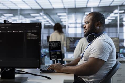 Engineer Managing And Optimizing Data Center Infrastructure Stock Image