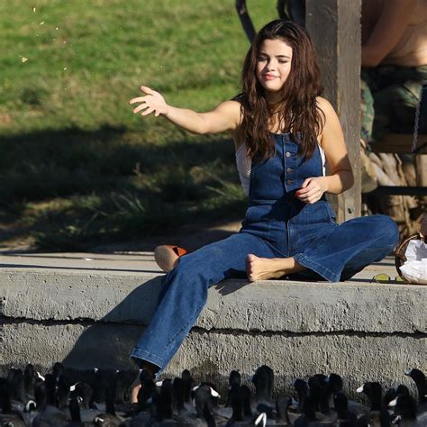 Selena Gomez Wears Flared Wrangler Overalls in Los Angeles