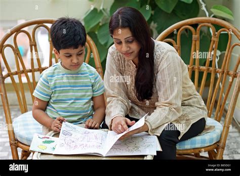 Indian Mother Teaching Kid Hi Res Stock Photography And Images Alamy