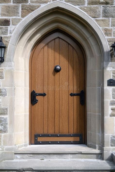 Heavy Oak Door With Iron Hinges Features Classic Design Set In Stone