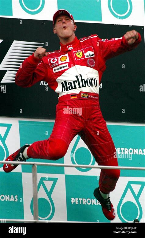 Dpa The German F1 World Champion Michael Schumacher Ferrari Jumps