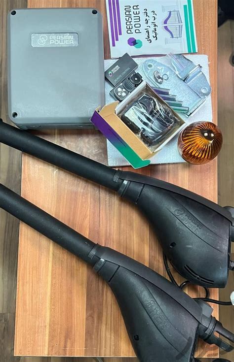 درب اتوماتیک برقی در کرکره آلومینیومی جک بازوییمصالح و تجهیزات ساختمان