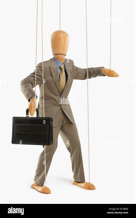 Puppet Dressed As A Businessman Stock Photo Alamy