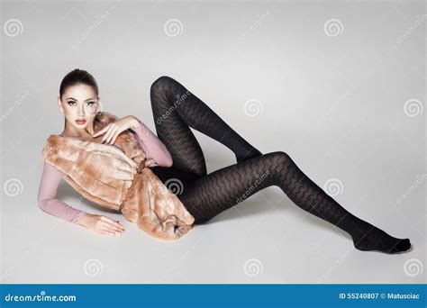 Beautiful Woman With Long Legs Dressed Elegant Posing Stock Image