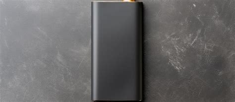 Premium Ai Image Photo Of A Black Lighter On A Gray Background With