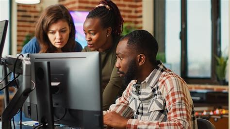 Premium Photo Group Of Software Developers Using Creative Skills To