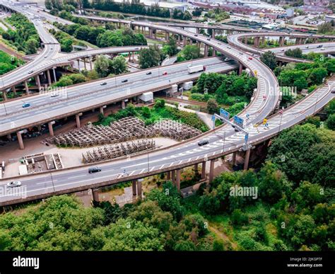An Aerial View Of A Complex Motorway Road Junction With Traffic Stock
