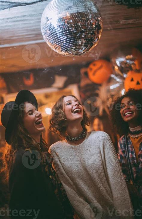 Three Women Laughing And Smiling In A Halloween Party 71981972 Stock