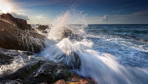 Waves Crashing On Rocks Background Waves Rocks Sea Background Image
