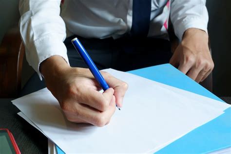 Premium Photo Businessman Hands Writing On Paper Freelancer Man Working Filtered Image