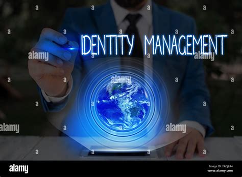 Conceptual Hand Writing Showing Identity Management Concept Meaning
