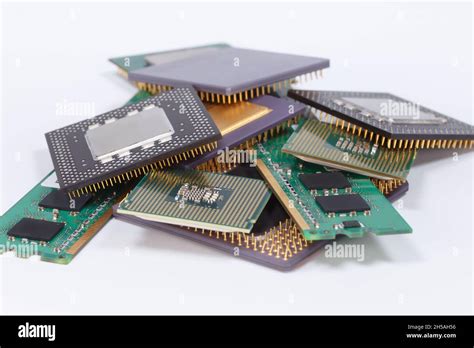 Old CPUs and memory modules heap on a white background И Stock Photo Alamy