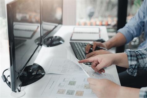 premium photo teamwork programming developing using computer at the