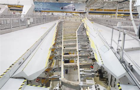 First A350 1000 Wing Goes Into Production Commercial Aircraft Airbus