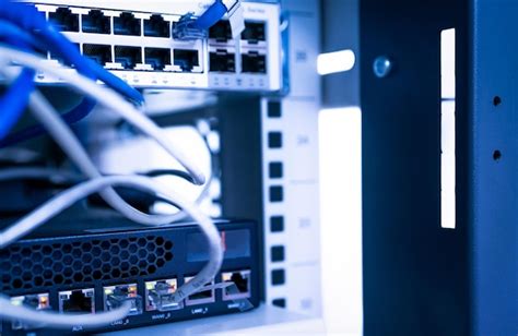 Premium Photo Network Switch And Ethernet Cable In Data Center Wifi Plug Of Internet Router