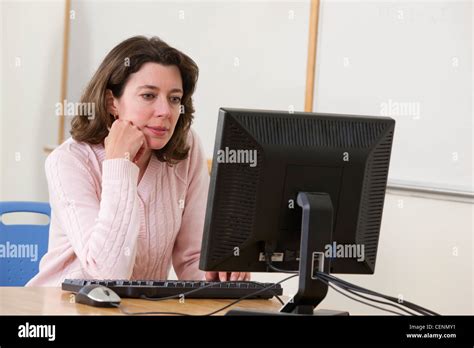 Engineering Student Studying Computer Display In A Classroom Stock