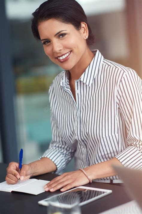 Shes A Professional At Problem Solving Portrait Of A Young Businesswoman Writing Notes At An