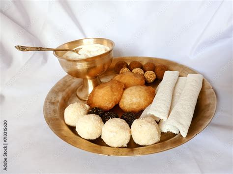 Assamese Traditional Food Items Like Pitha Laddu Doi Sira With