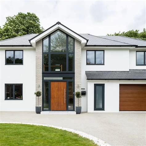 Contemporary White Render House Exterior In Surrey